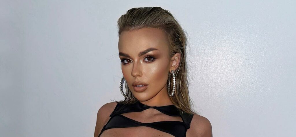 Tallia Storm Channels 'Monsters, Inc.' In A Blue See-Through Dress