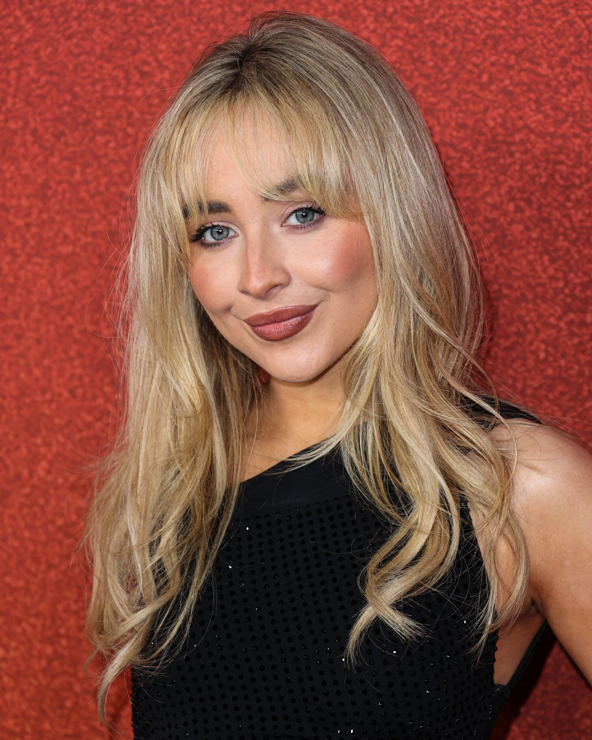 Sabrina Carpenter In Leather Bra Shows Off Her ‘Power Move’