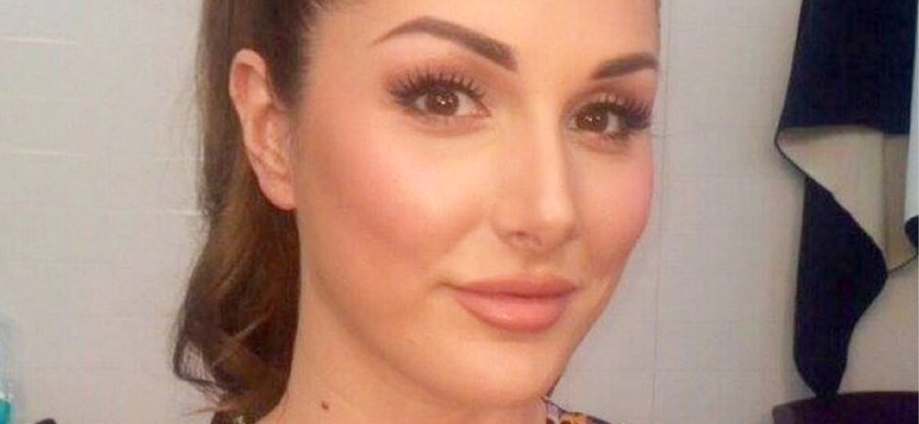 Lucy Pinder Melts Her Ice Cream In Plunging Waitress Outfit