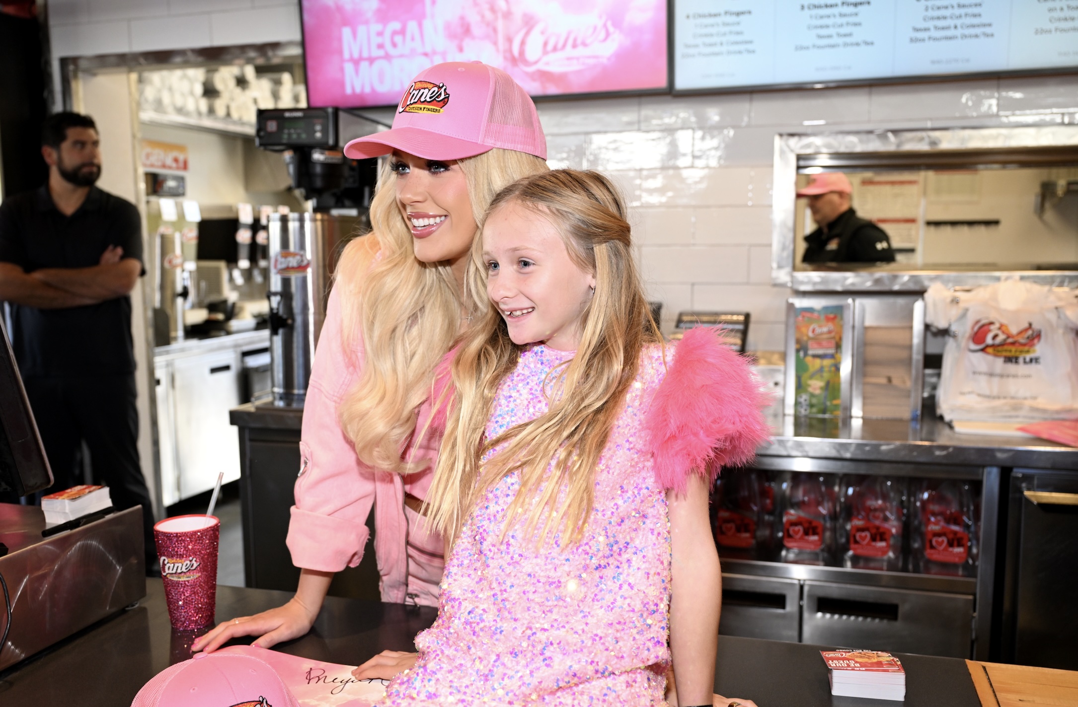 Megan Moroney’s UGA Pop-Up Adds A Pink-Sparkled Chapter To Raising Cane’s