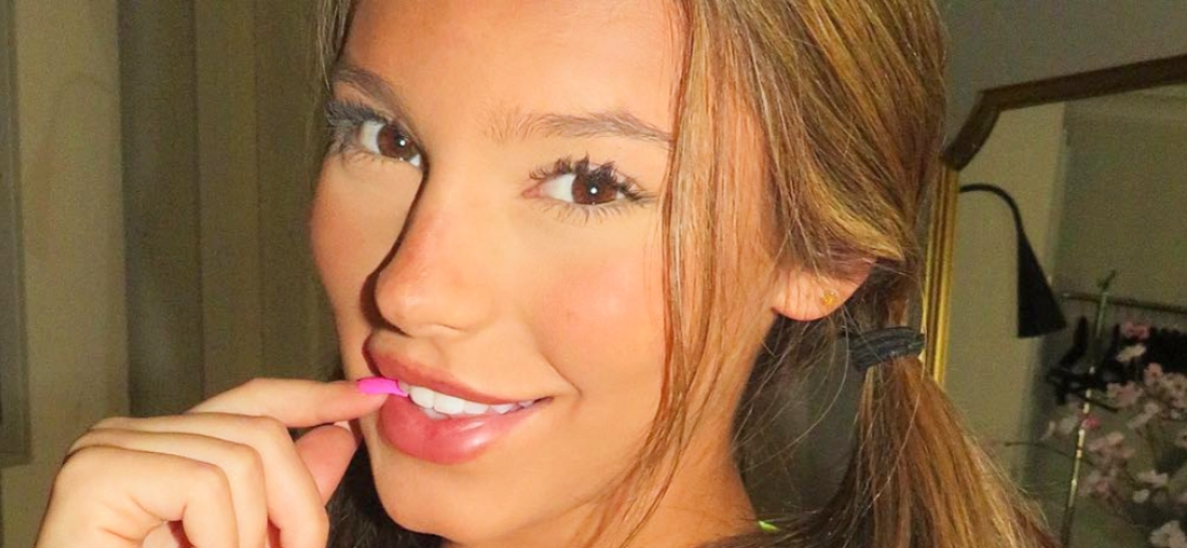 Gymnast Sydney Smith In Plunging Bikini Asked If 'They're Real'