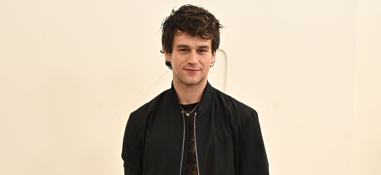 Brandon Flynn Flaunts ‘Lips And Pits’ In Shirtless Pool Snap